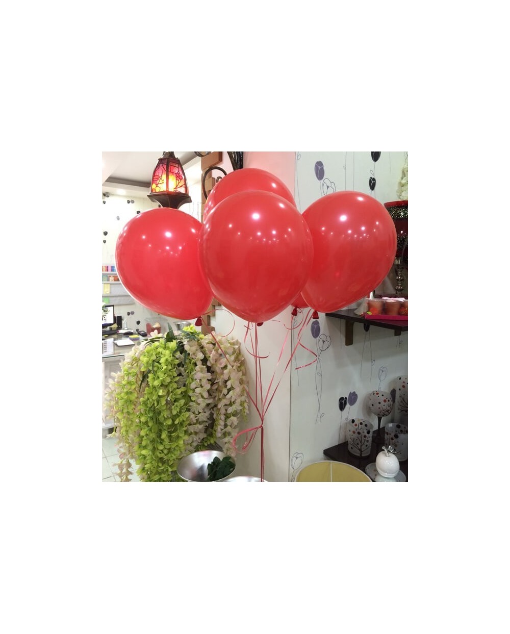 Helium filled 6 red balloons
