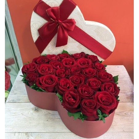 Composition of 25 red roses in a heart shape box